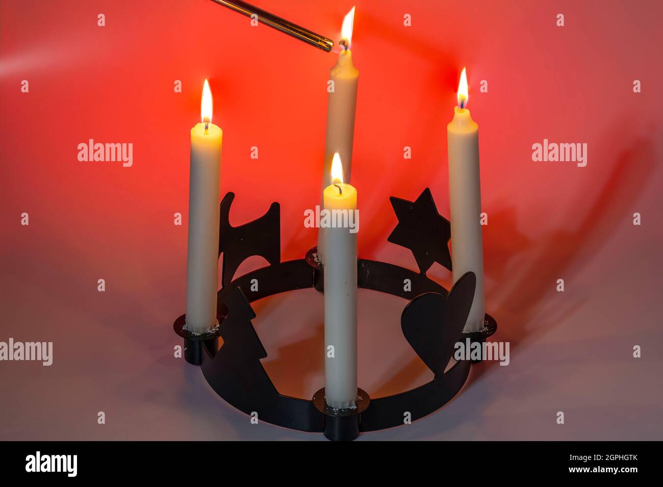 Close up view of burning candle in honor of fourth advent. Sweden Stock ...
