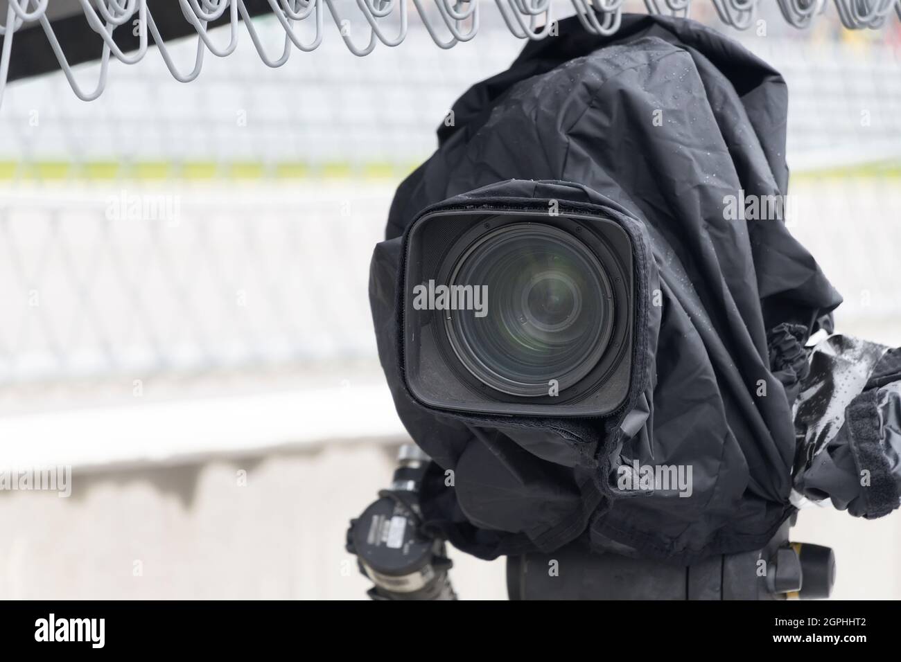 TV camera broadcasting live a race at motor racing track Stock Photo ...
