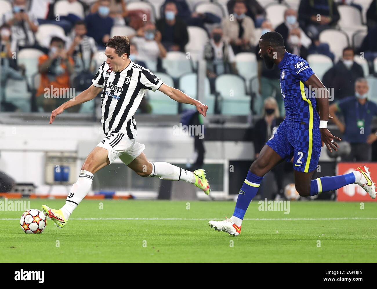 Juventus' Federico Chiesa (left) attempts a shot on goal during the ...