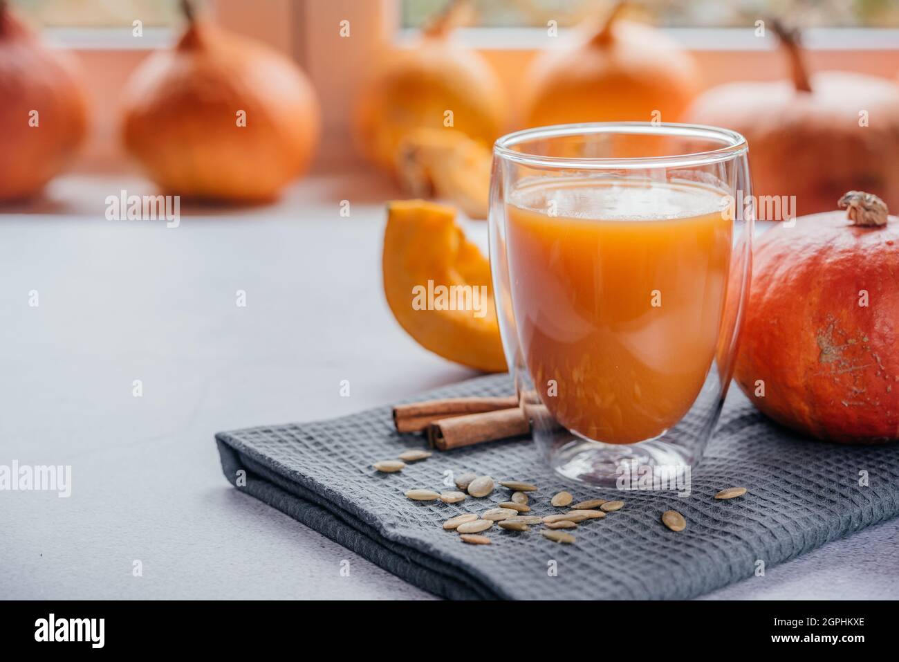 Autumn vegetable juice made of pumpkin Stock Photo - Alamy