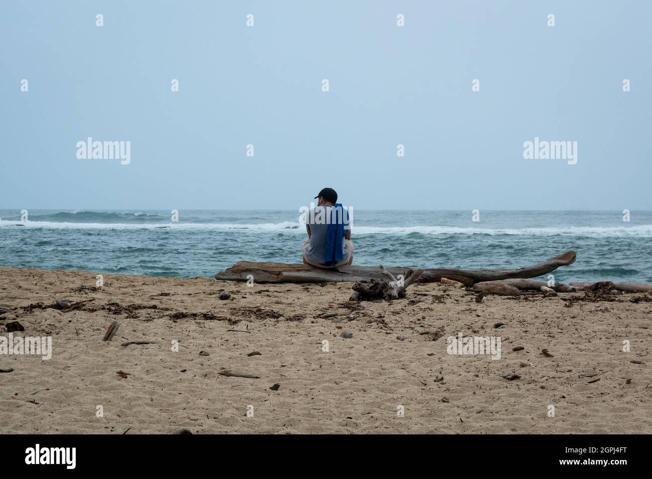 Depressed person looking ocean on hi-res stock photography and images ...