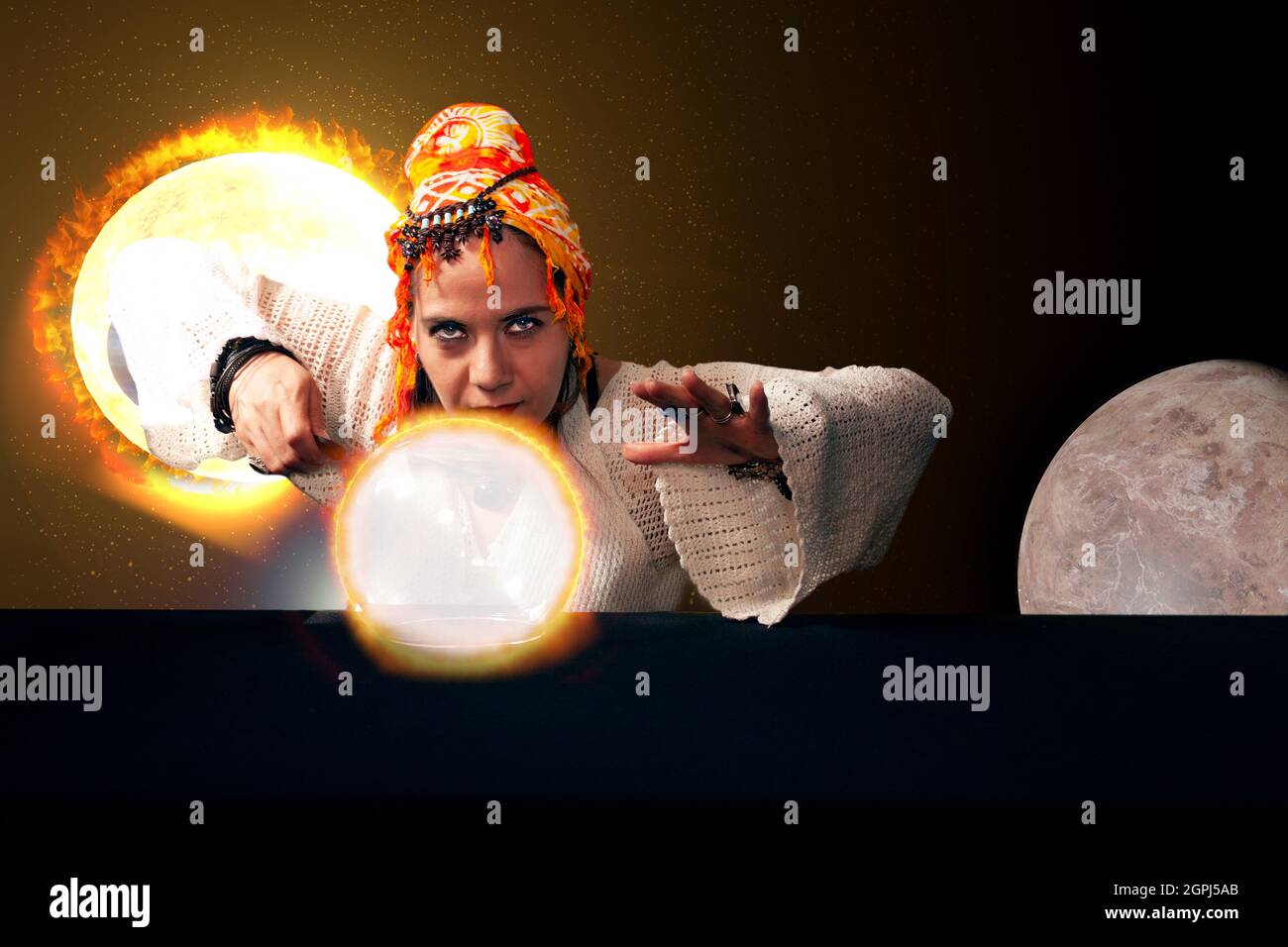 Gypsy woman full of jewelry making a prediction based on reading a ...