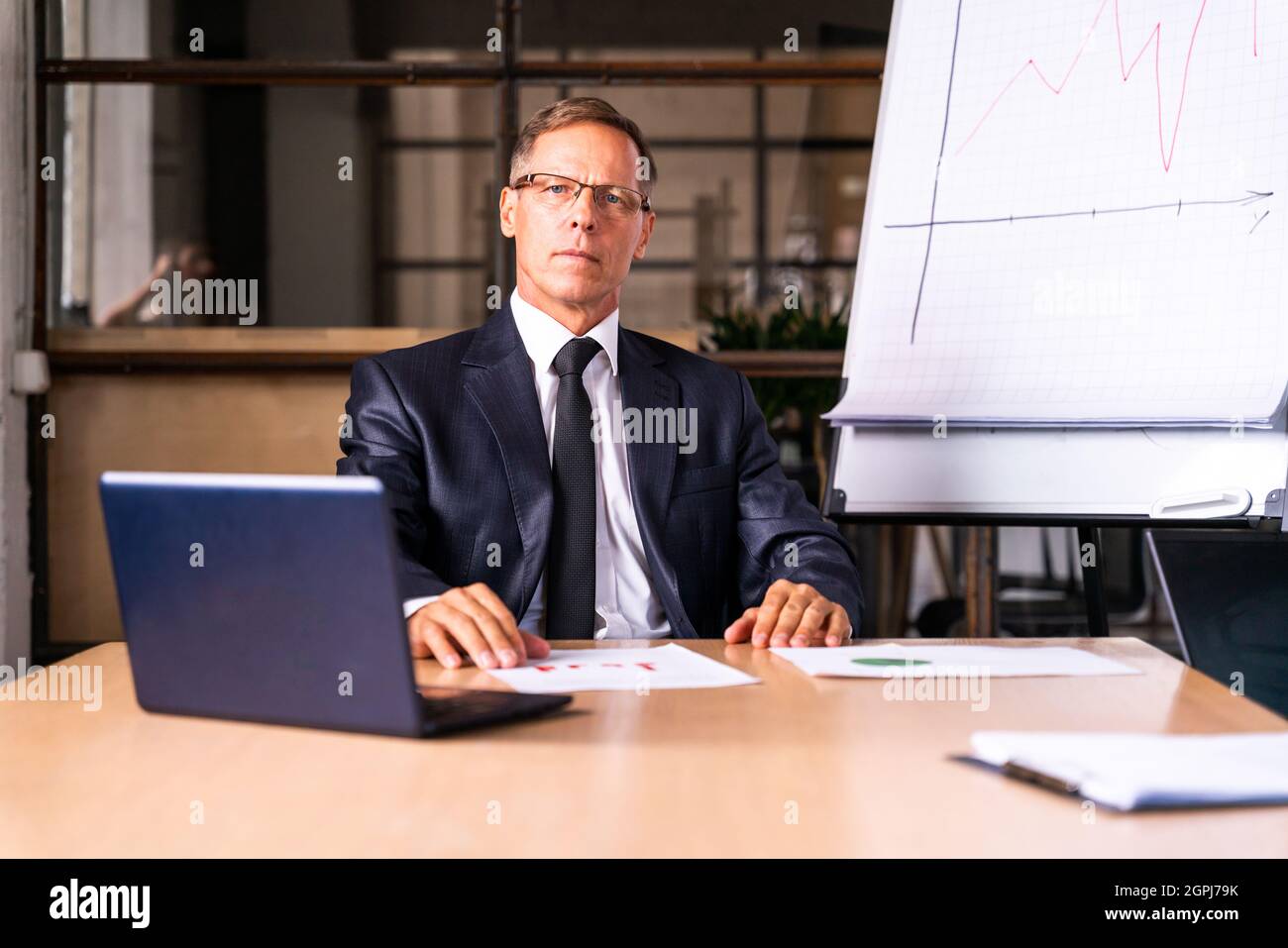 Business man with formal wear working in the office Stock Photo - Alamy