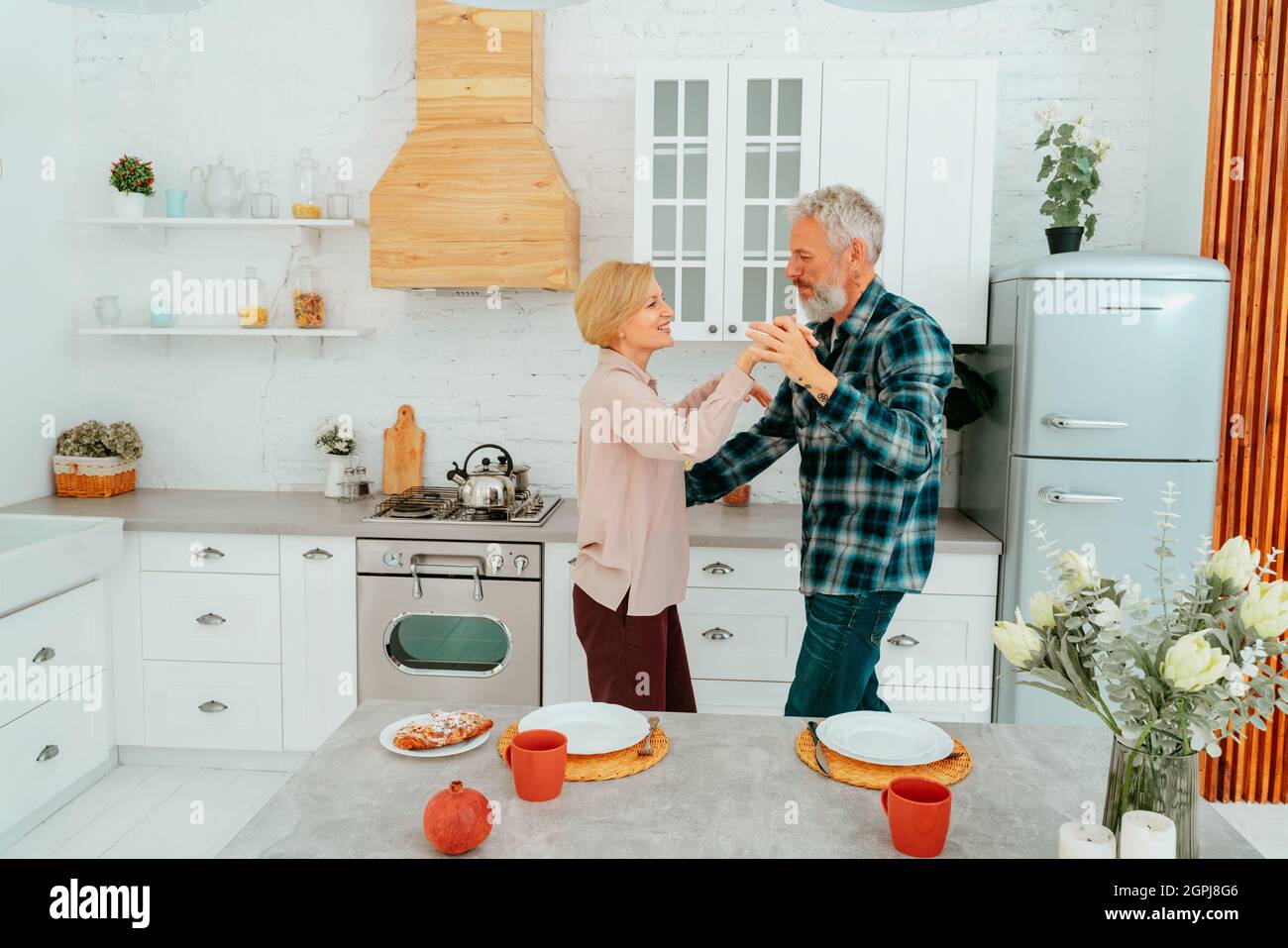 husband and wife dance at home during breakfast Stock Photo - Alamy