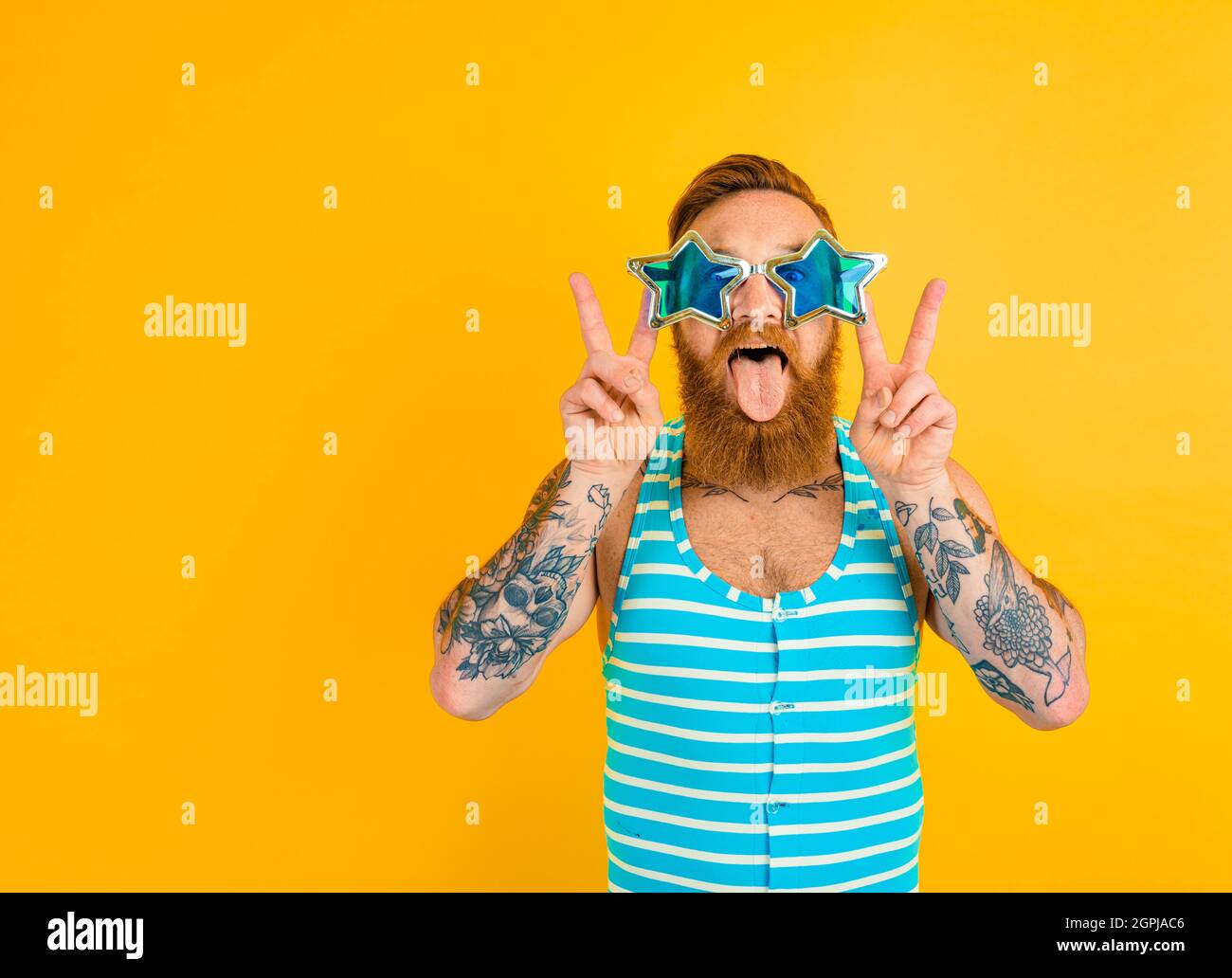 man with beard,tattoos and swimsuit is ready for the summer Stock Photo ...