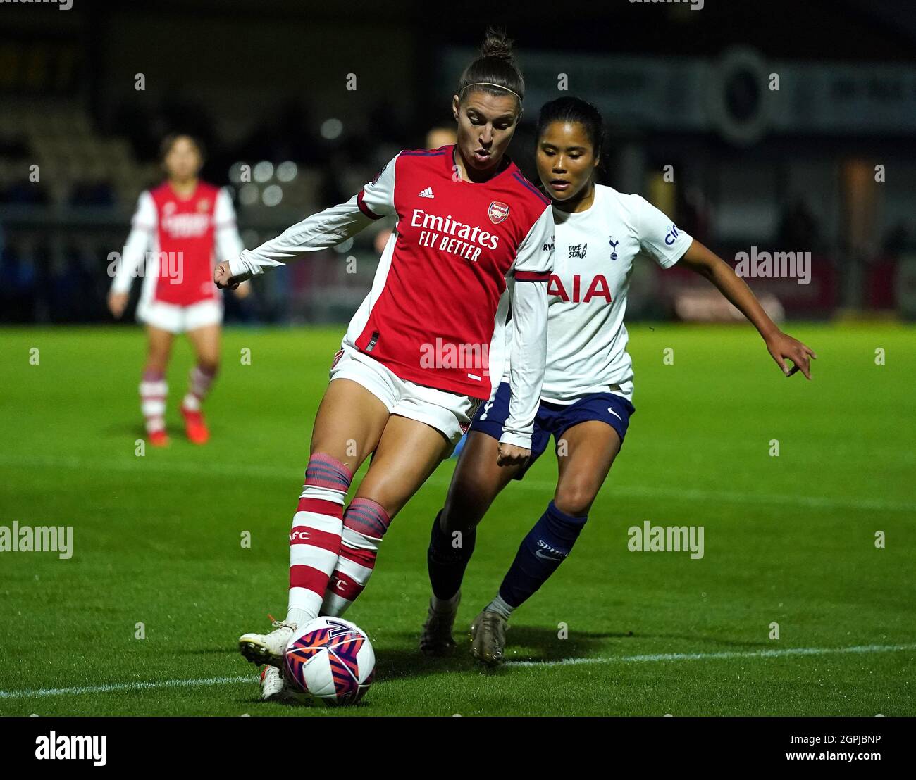 Arsenal's Steph Catley (left) and Tottenham Hotspur's Asmita Ale battle ...