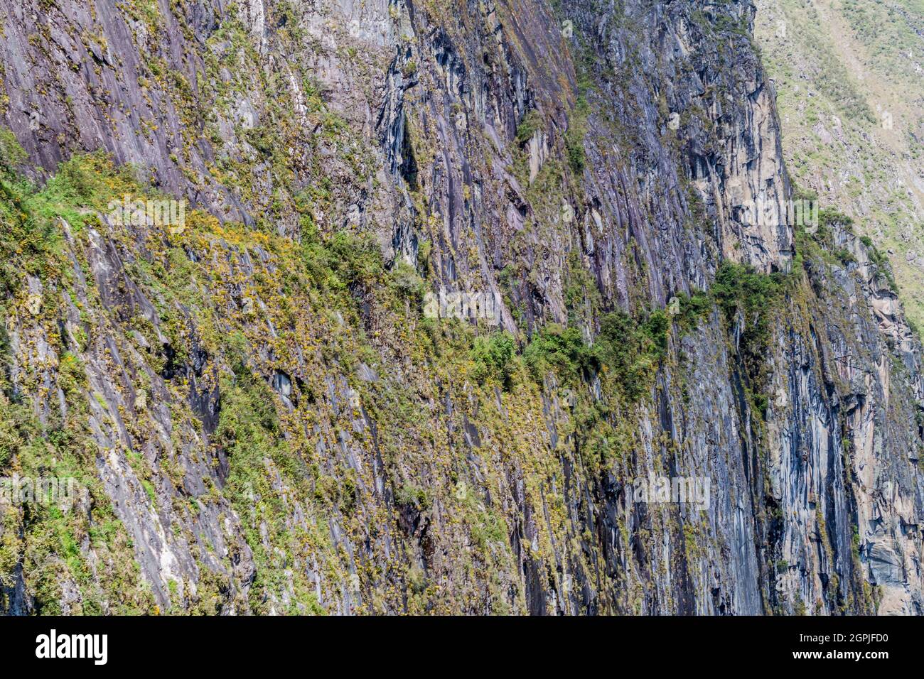 Inca trail carved into a stone wall near Machu Picchu ruins, Peru Stock ...