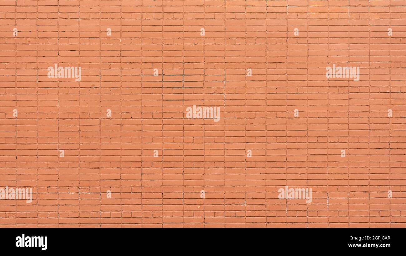 Solid brick wall as background and texture Stock Photo - Alamy