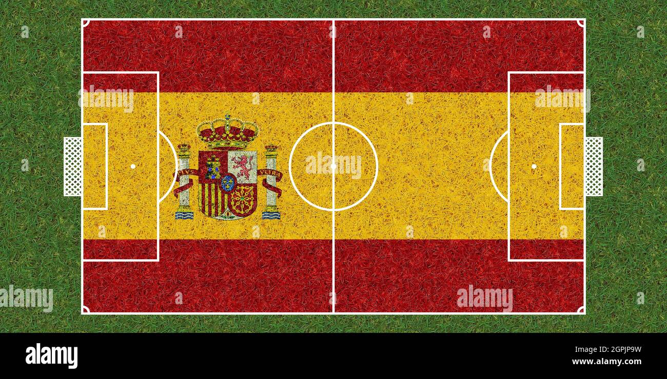 Top view of Green grass soccer field with flag of Spain. football ...