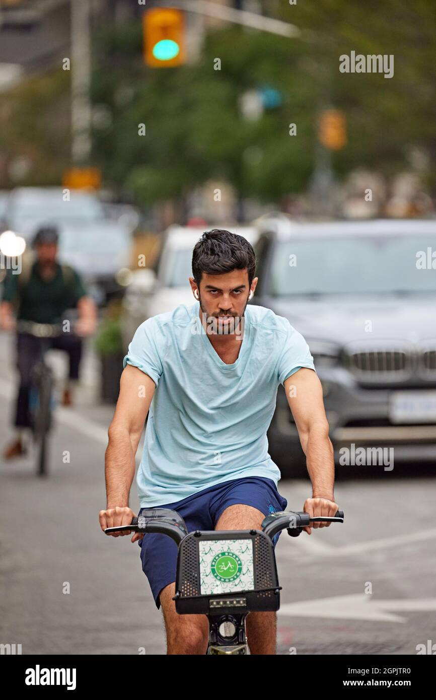 Toronto cyclists and pedestrians Stock Photo - Alamy