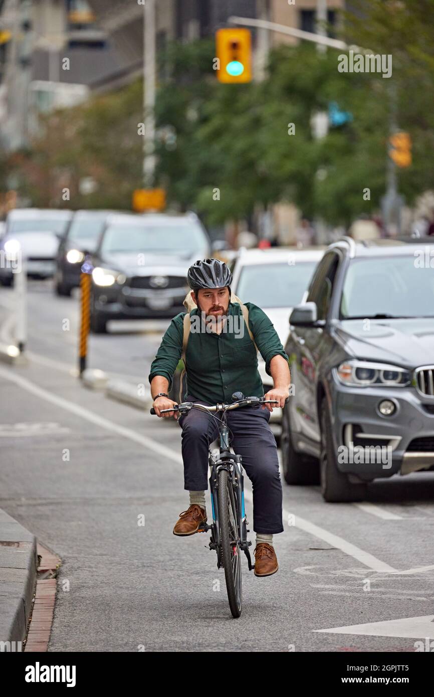 Toronto cyclists and pedestrians Stock Photo - Alamy