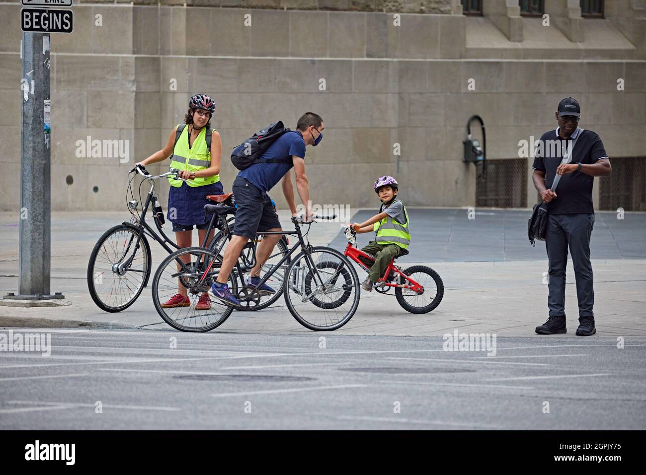 Toronto cyclists and pedestrians Stock Photo - Alamy