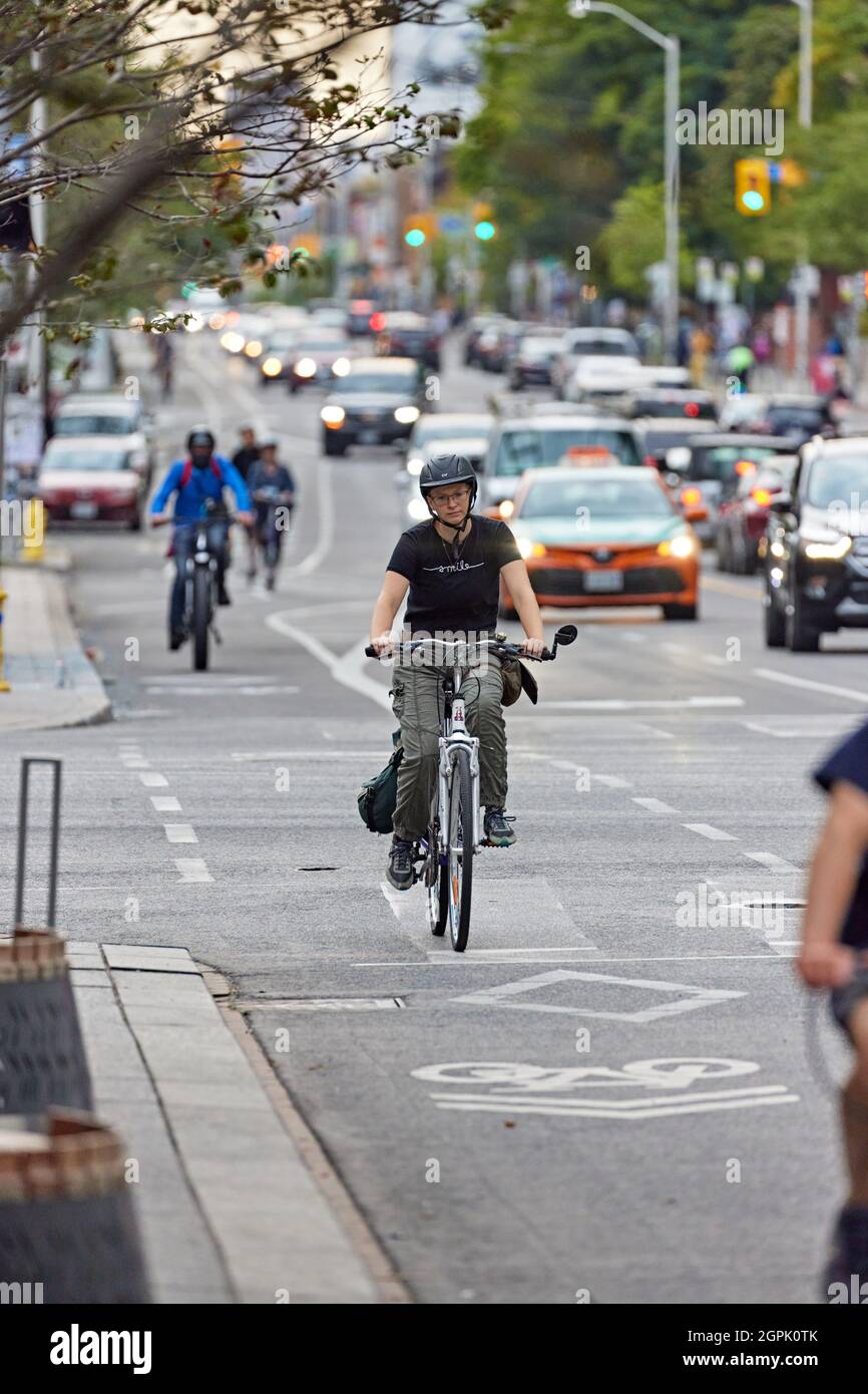 Toronto cyclists and pedestrians Stock Photo - Alamy