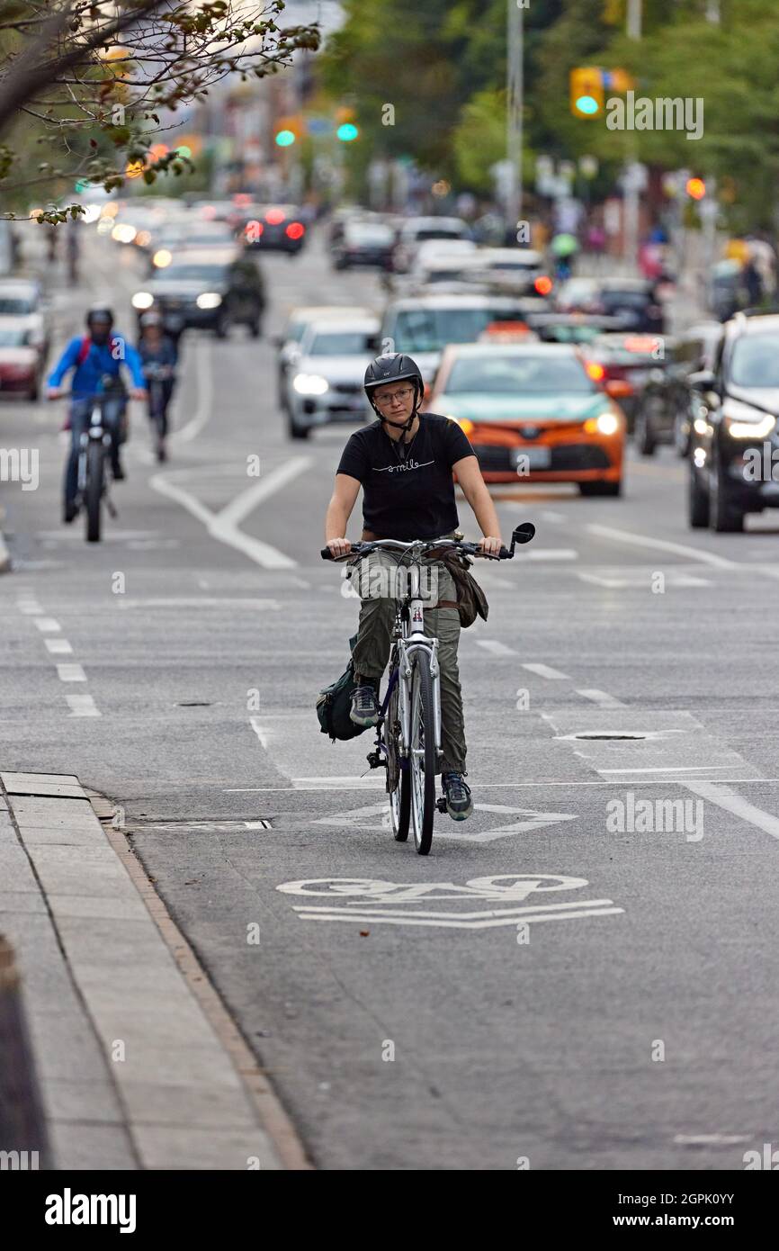 Toronto cyclists and pedestrians Stock Photo - Alamy