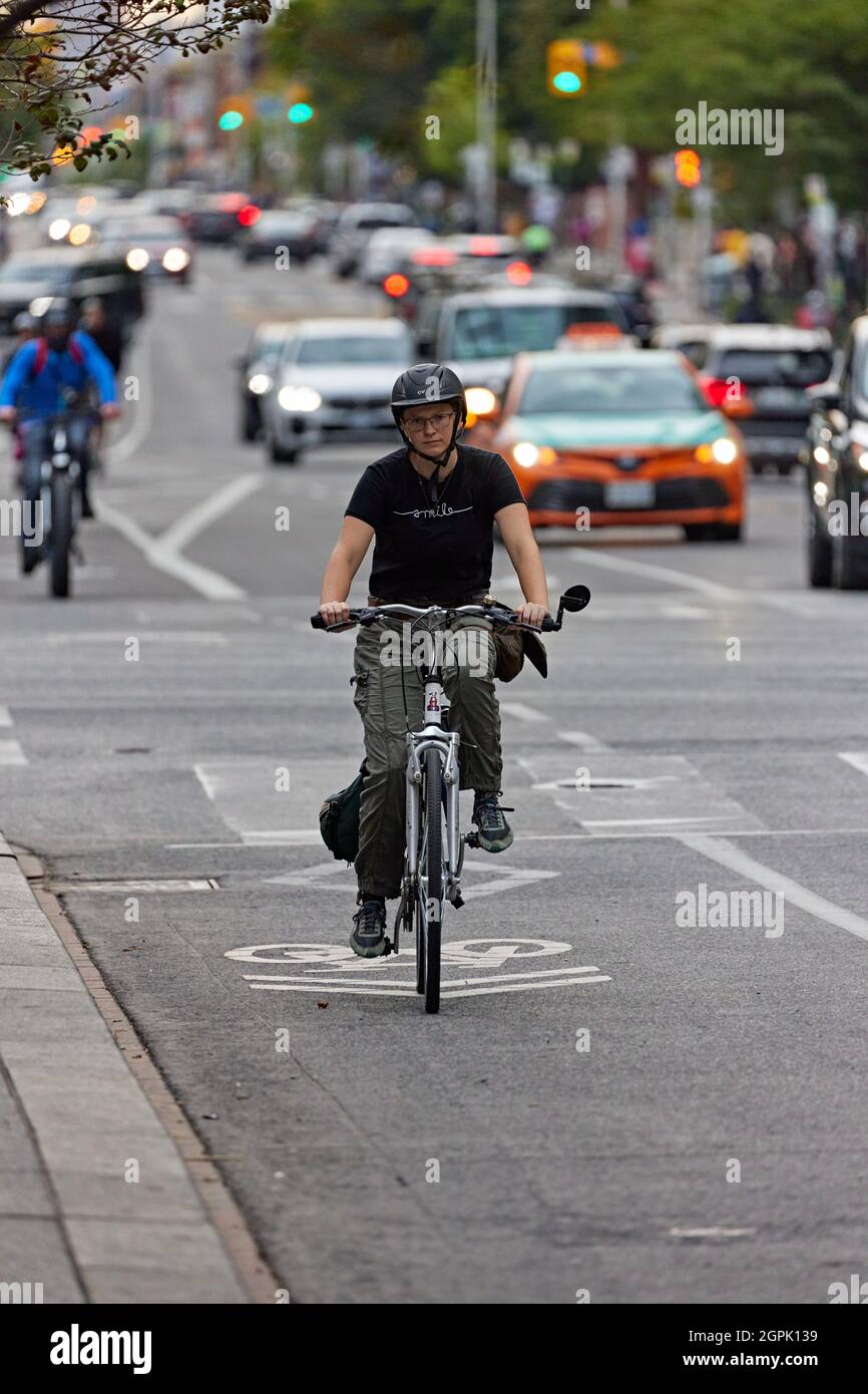 Toronto cyclists and pedestrians Stock Photo - Alamy