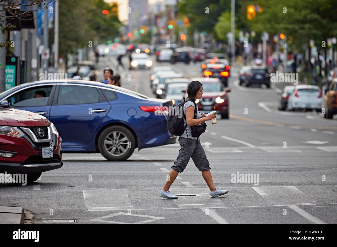 Toronto cyclists and pedestrians Stock Photo - Alamy