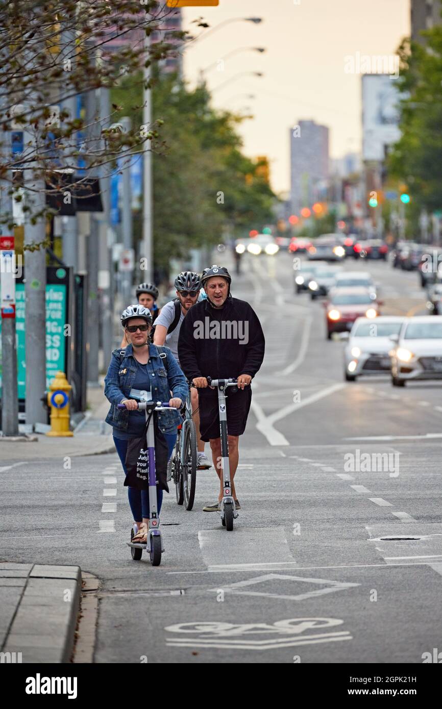 Toronto cyclists and pedestrians Stock Photo - Alamy