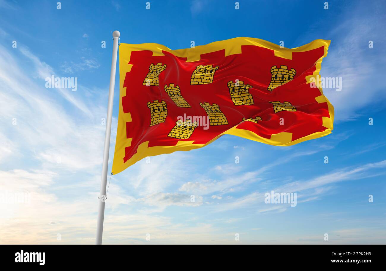 flag of county Greater Manchester variant, UK at cloudy sky background ...