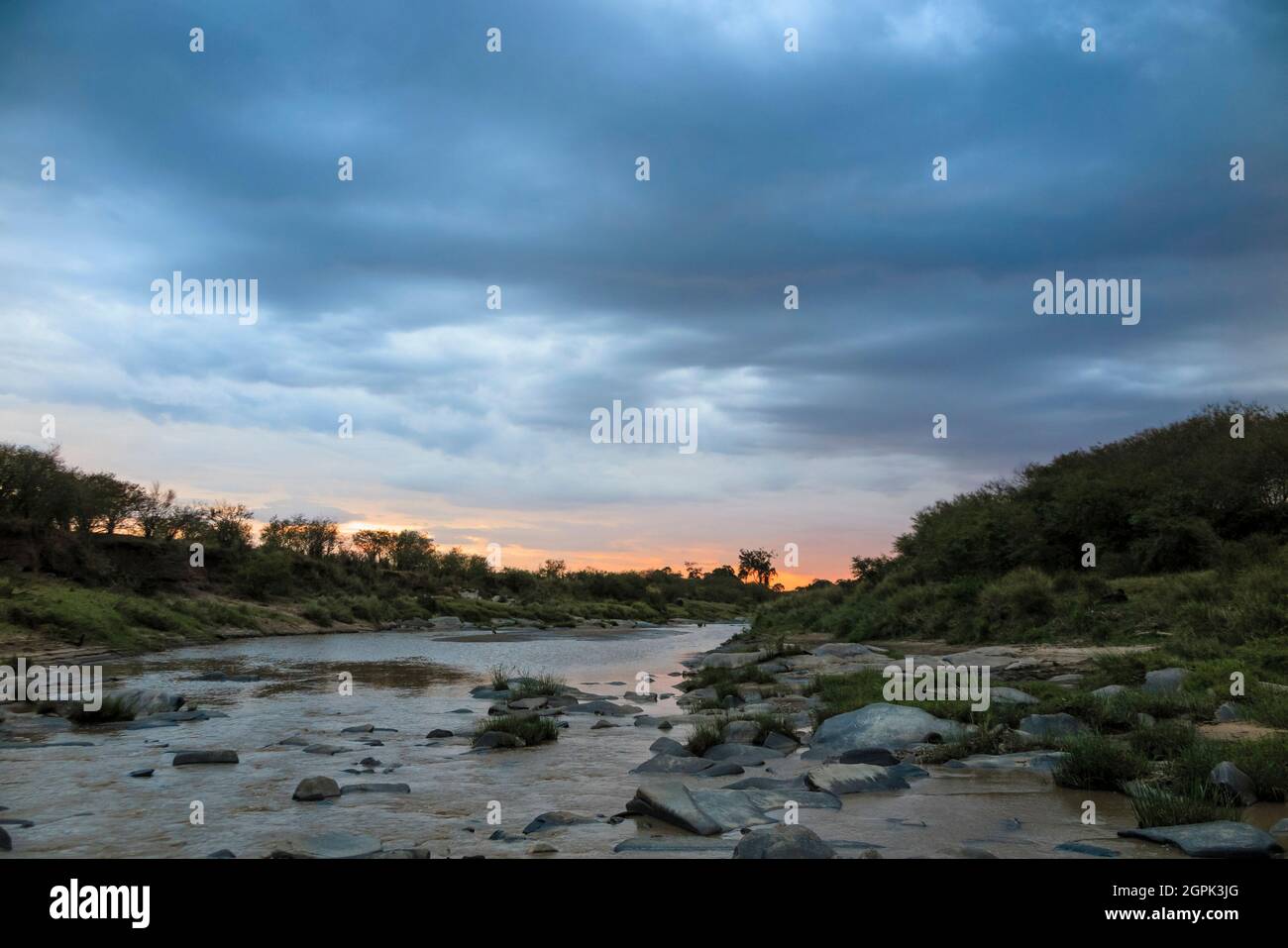 Shallow river crossing in the Masai Mara, Kenya seen in the afternoon ...