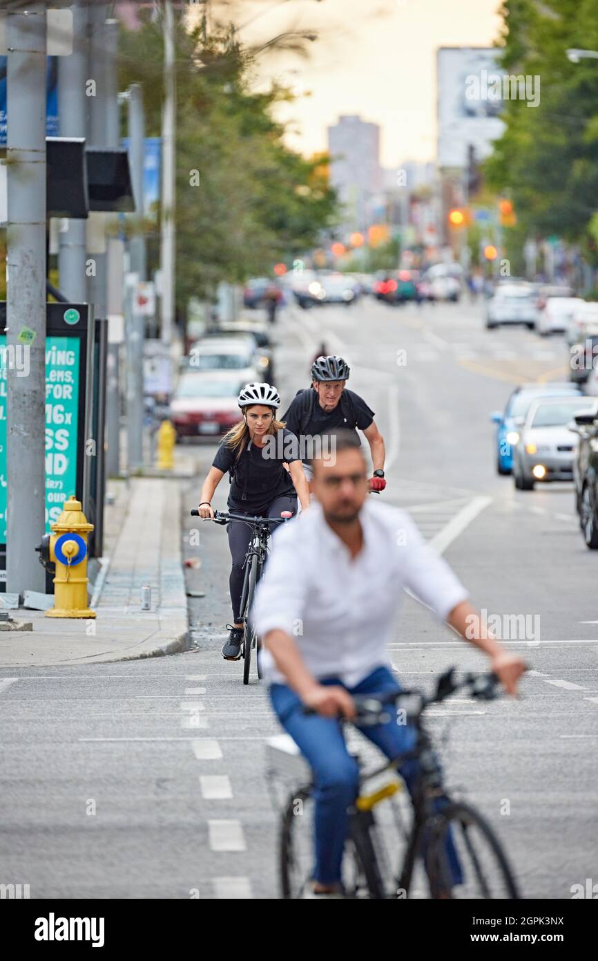 Toronto cyclists and pedestrians Stock Photo - Alamy