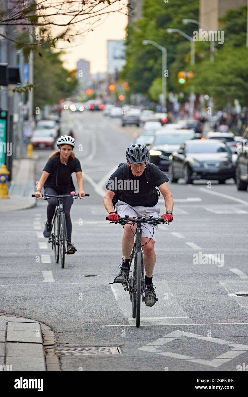Toronto cyclists and pedestrians Stock Photo - Alamy