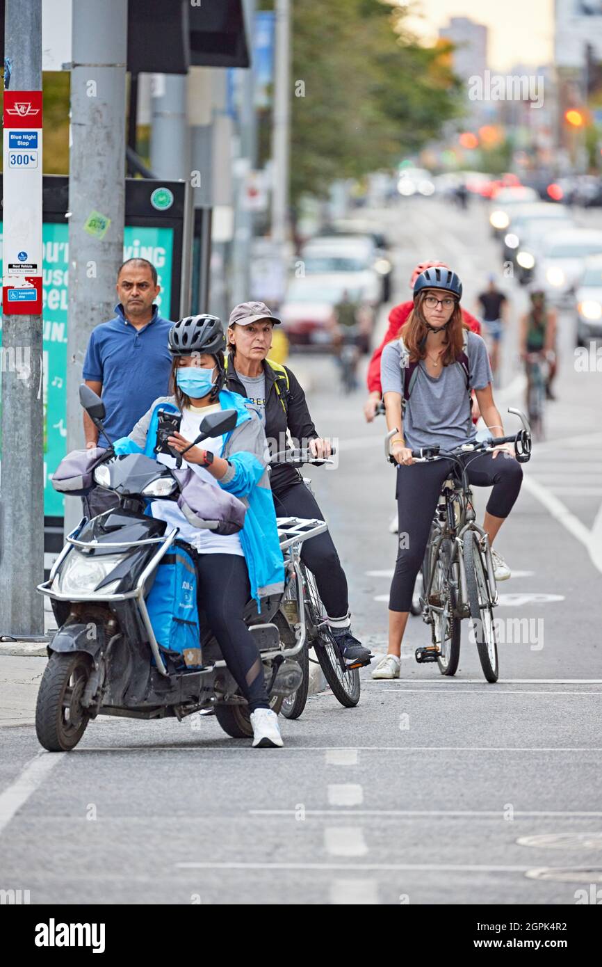 Toronto cyclists and pedestrians Stock Photo - Alamy