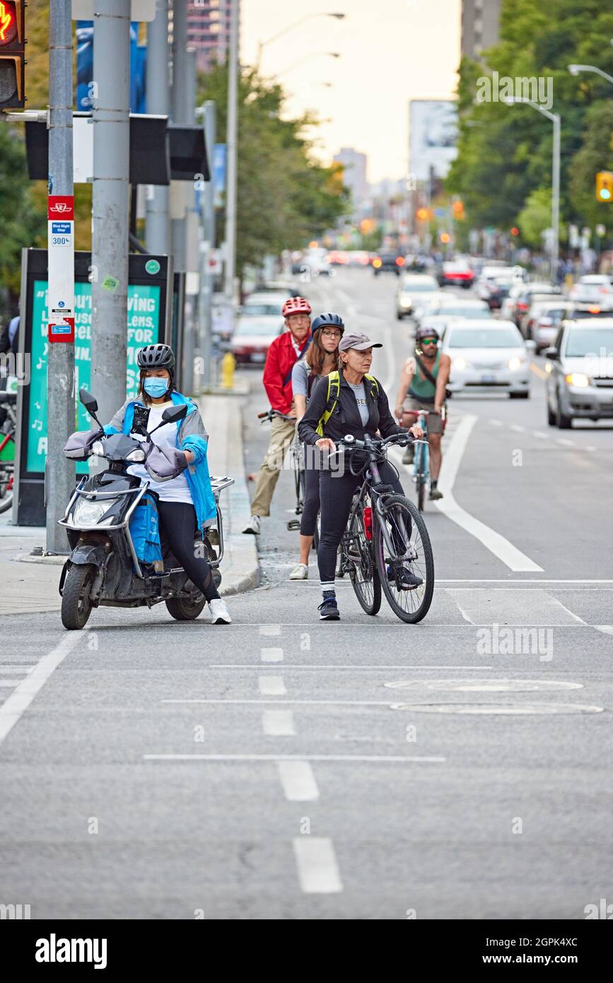 Toronto cyclists and pedestrians Stock Photo - Alamy