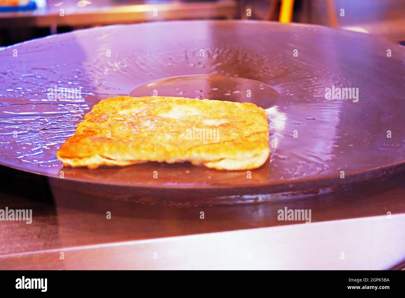 Chicken Murtaba (Indian food) on hot stove and blur background Stock ...