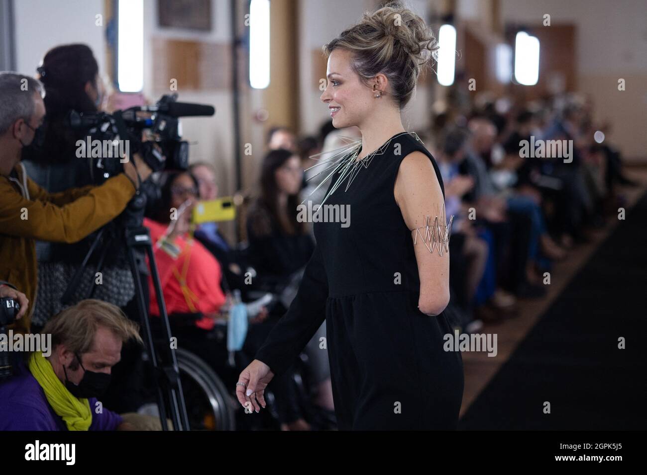 Amputee models display creations by Italian designer Fabio Porlod as ...