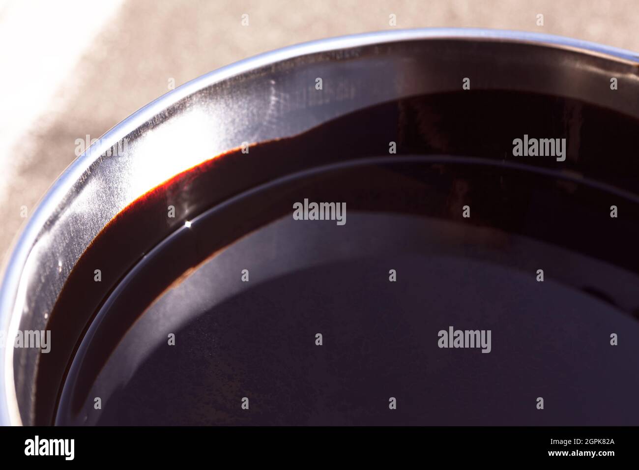 Resin surface in bucket . Waterproofing agent Stock Photo - Alamy