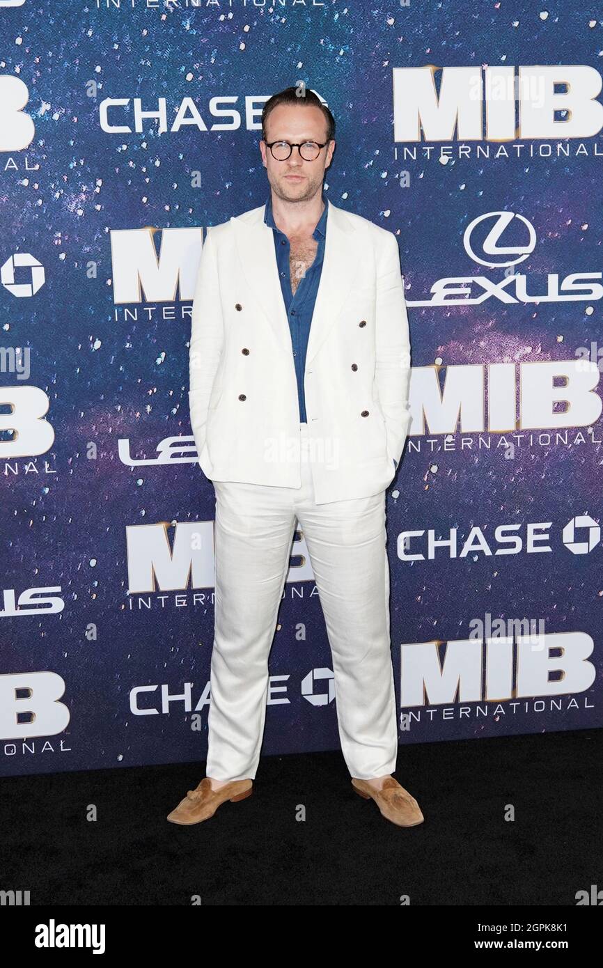 Men in black international rafe spall hi-res stock photography and ...