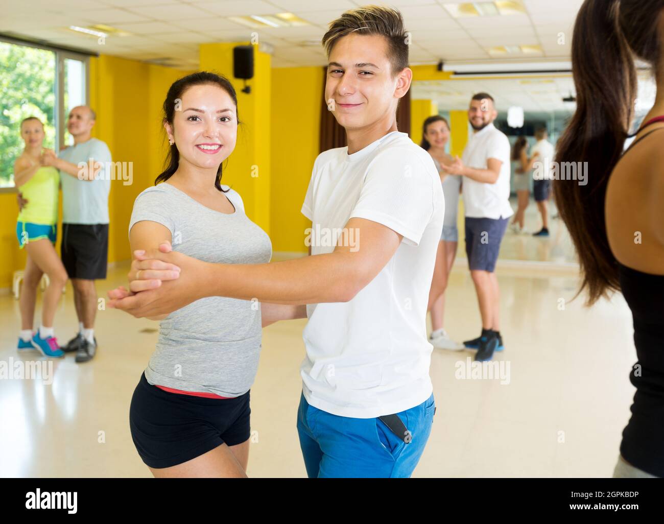 Smiling people dancing waltz Stock Photo - Alamy