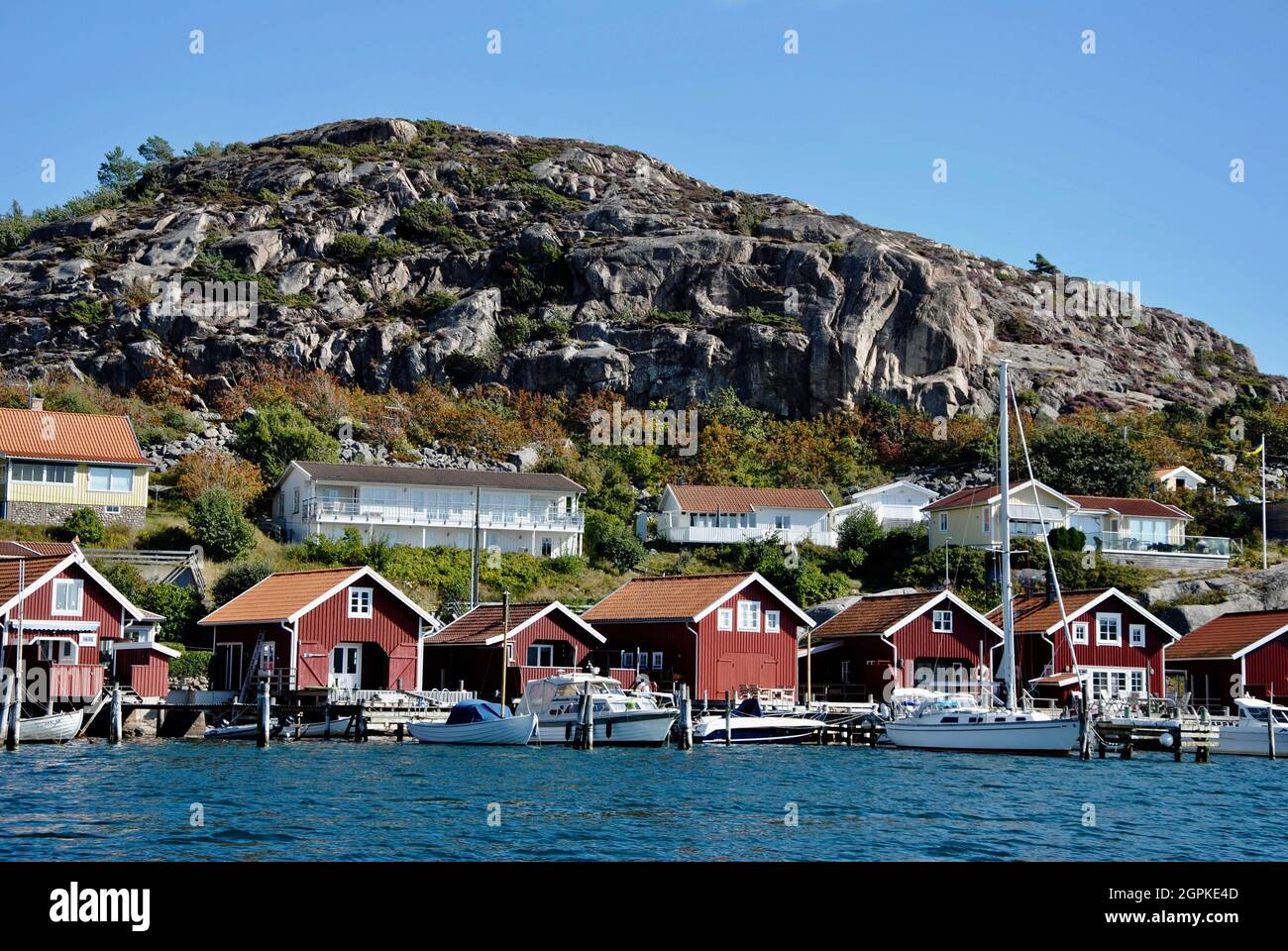 Fishermens cottages along waterfront, Fjällbacka, Sweden Stock Photo ...