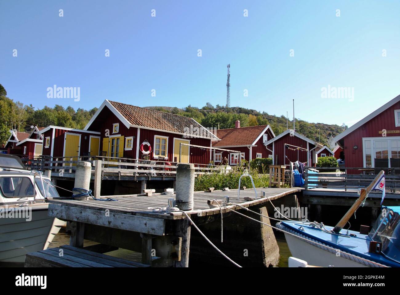 Fishermens cottages along waterfront, Fjällbacka, Sweden Stock Photo ...