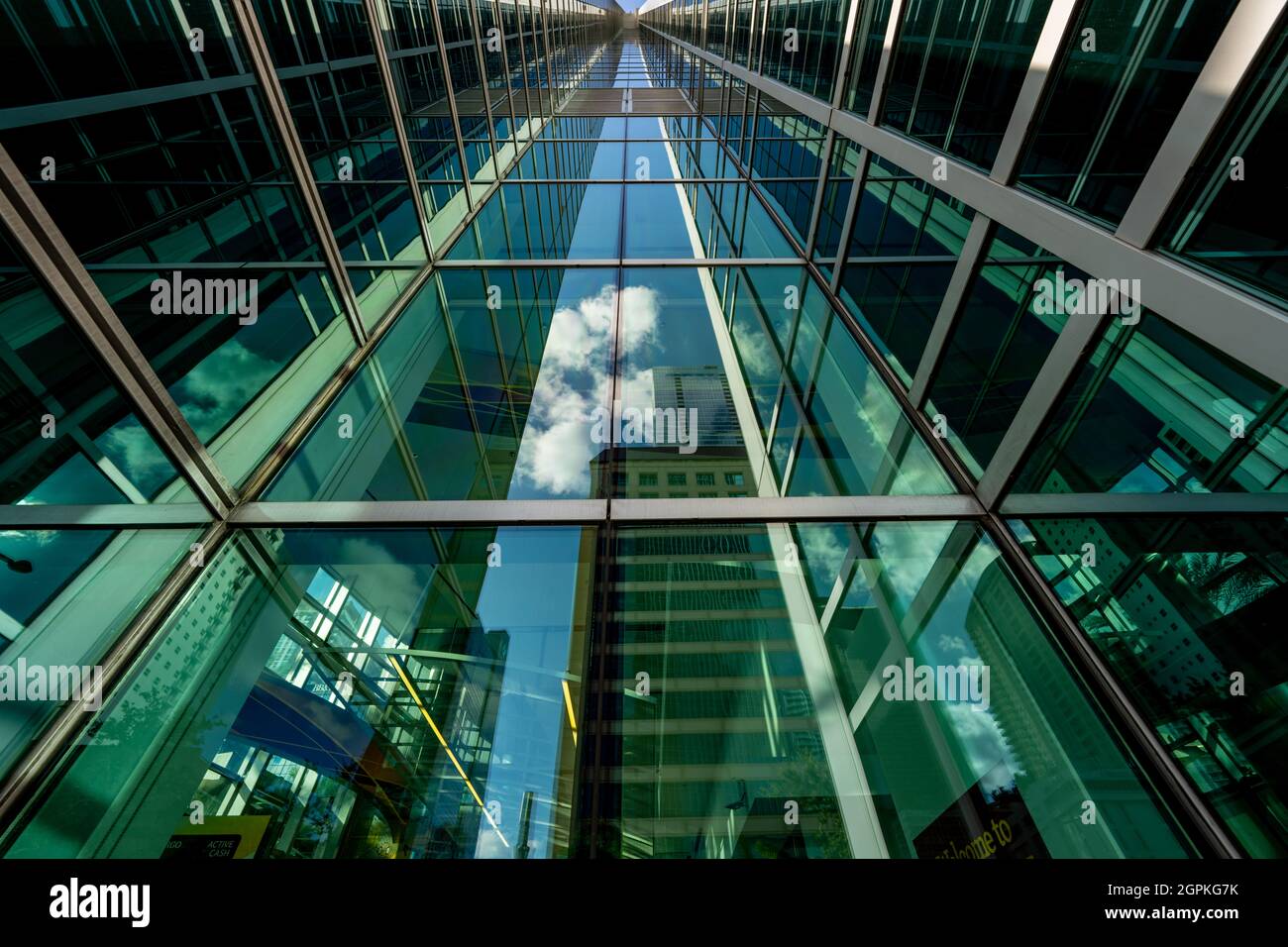 Ground angle photo looking directly up towards highrise towers in the ...
