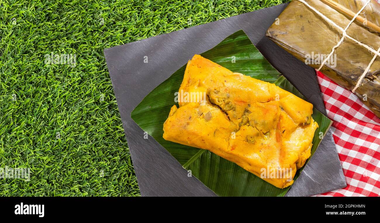 Tamale Typical Colombian Food Wrapped In Banana Leaves Stock Photo - Alamy
