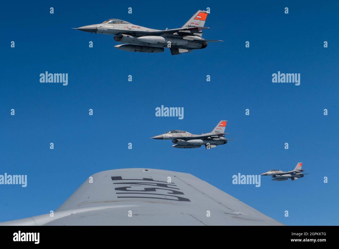Three Egyptian air force F-16 Fighting Falcons fly in formation during ...