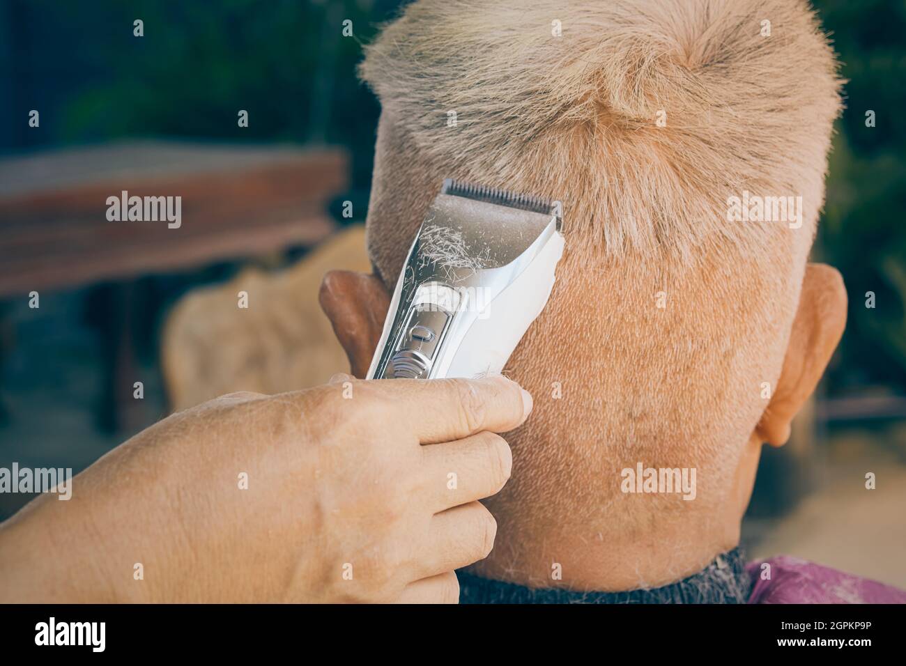 Barber or Hairdresser Use Clipper Cut Old Man Back Head Hair at Home ...
