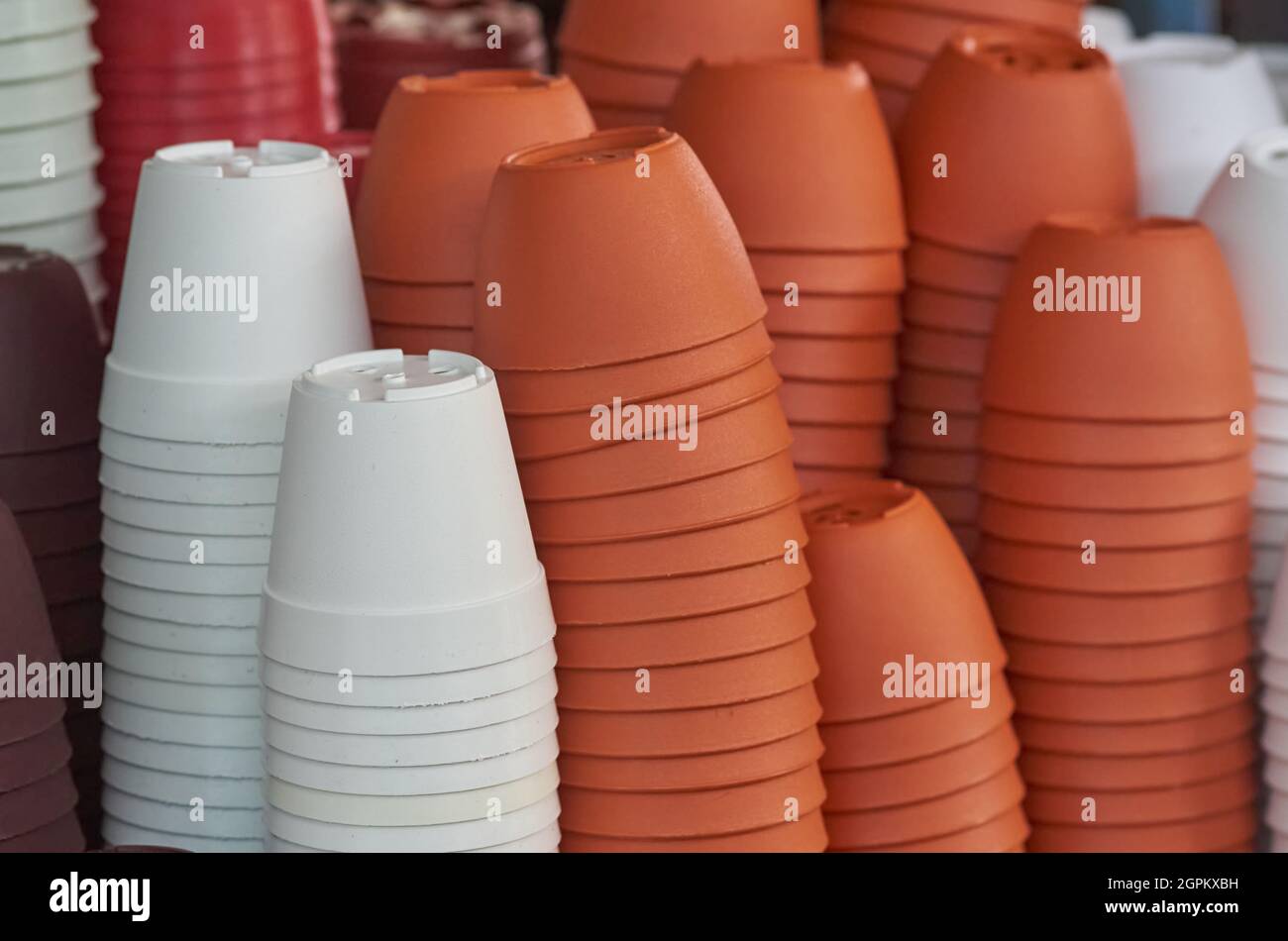 A lot of the plastic pots in the gardening shop Stock Photo - Alamy