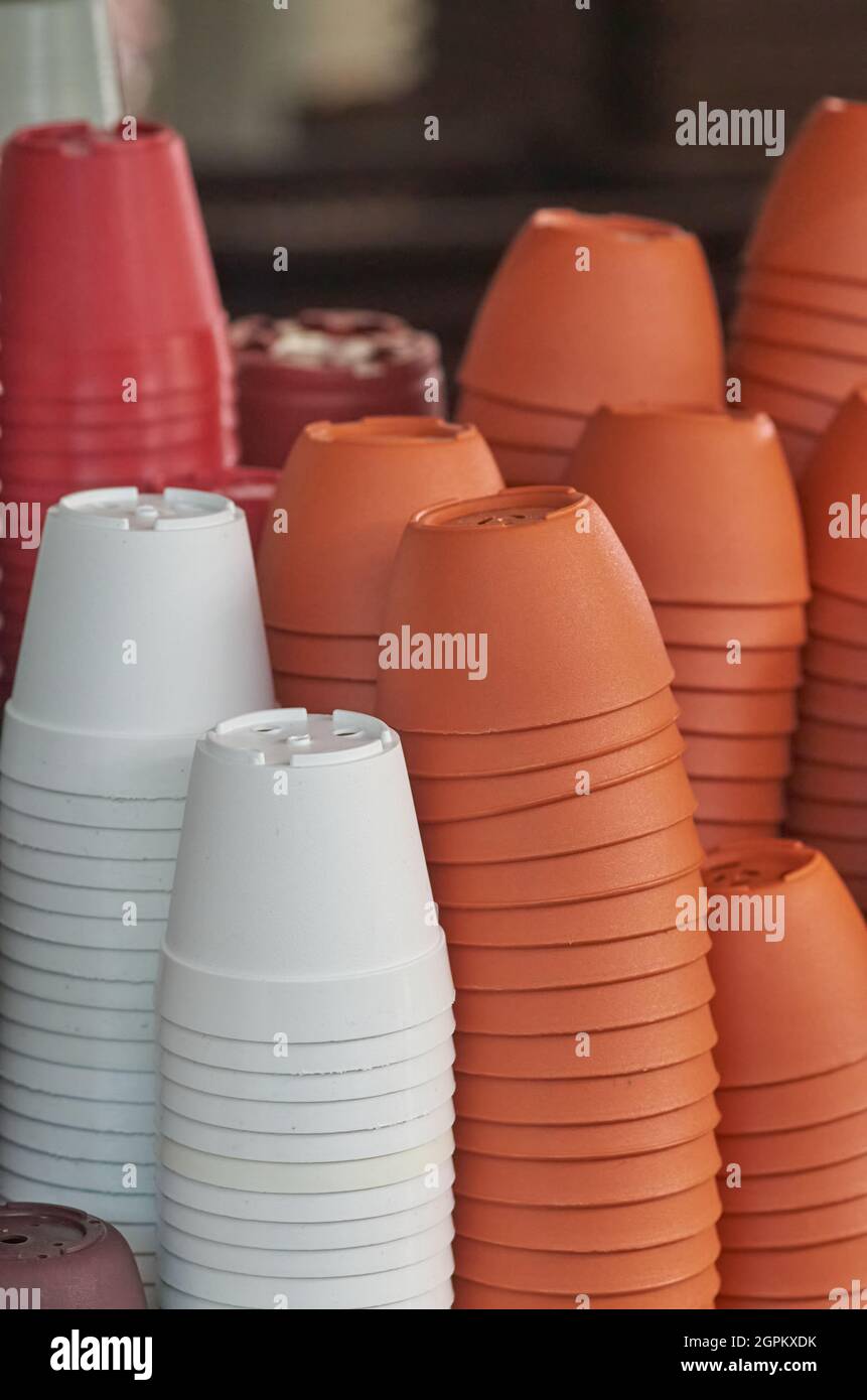 A lot of the plastic pots in the gardening shop Stock Photo - Alamy