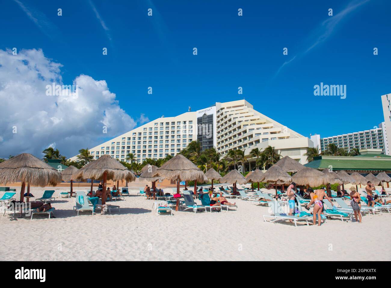 Iberostar Selection Cancun hotel and people on the beach, Cancun ...