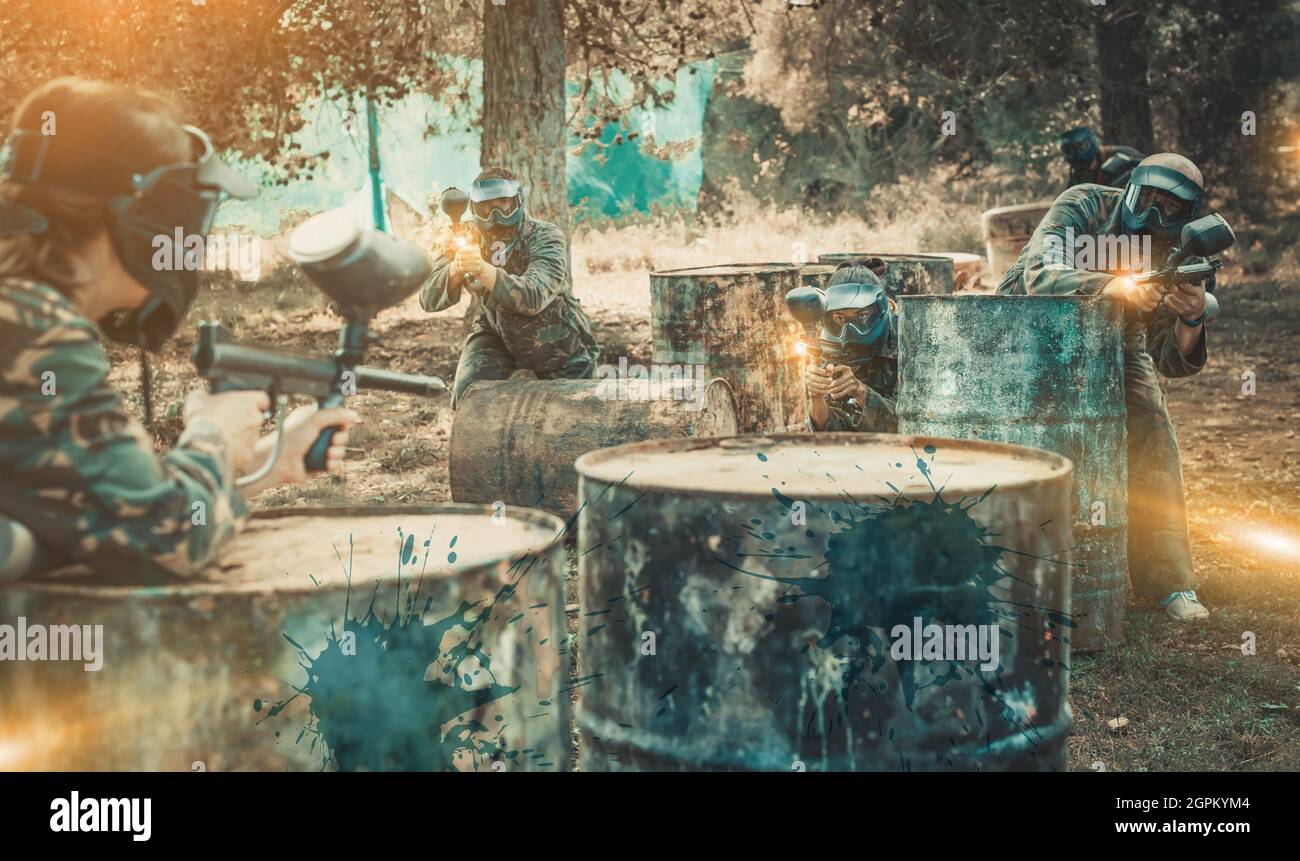 enthusiastic teams facing on battlefield in outdoor paintball ar Stock ...