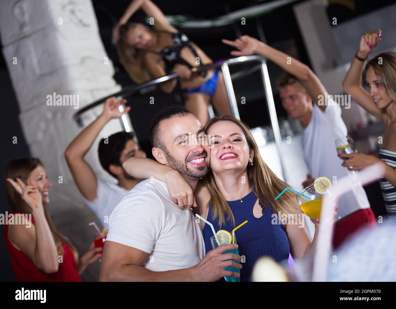 male and woman dancing and hugging on party Stock Photo - Alamy