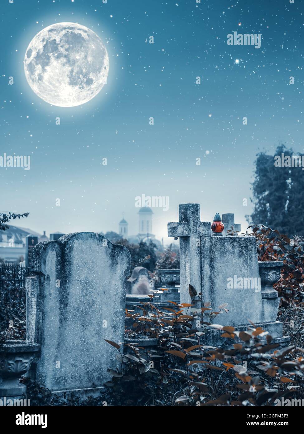 Tombstones in cemetery at night with full moon. Halloween concept Stock ...