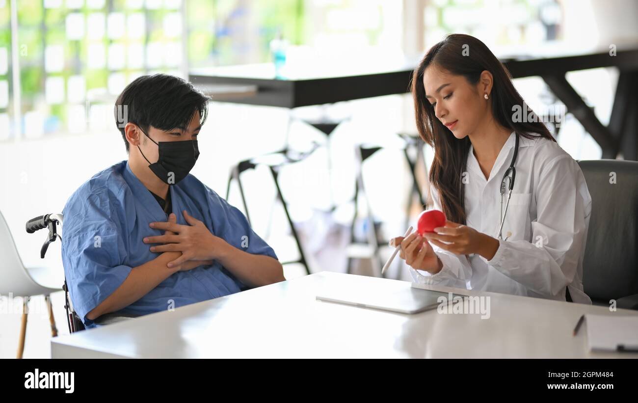 The doctor consulting with the patient about the disease's treatment ...