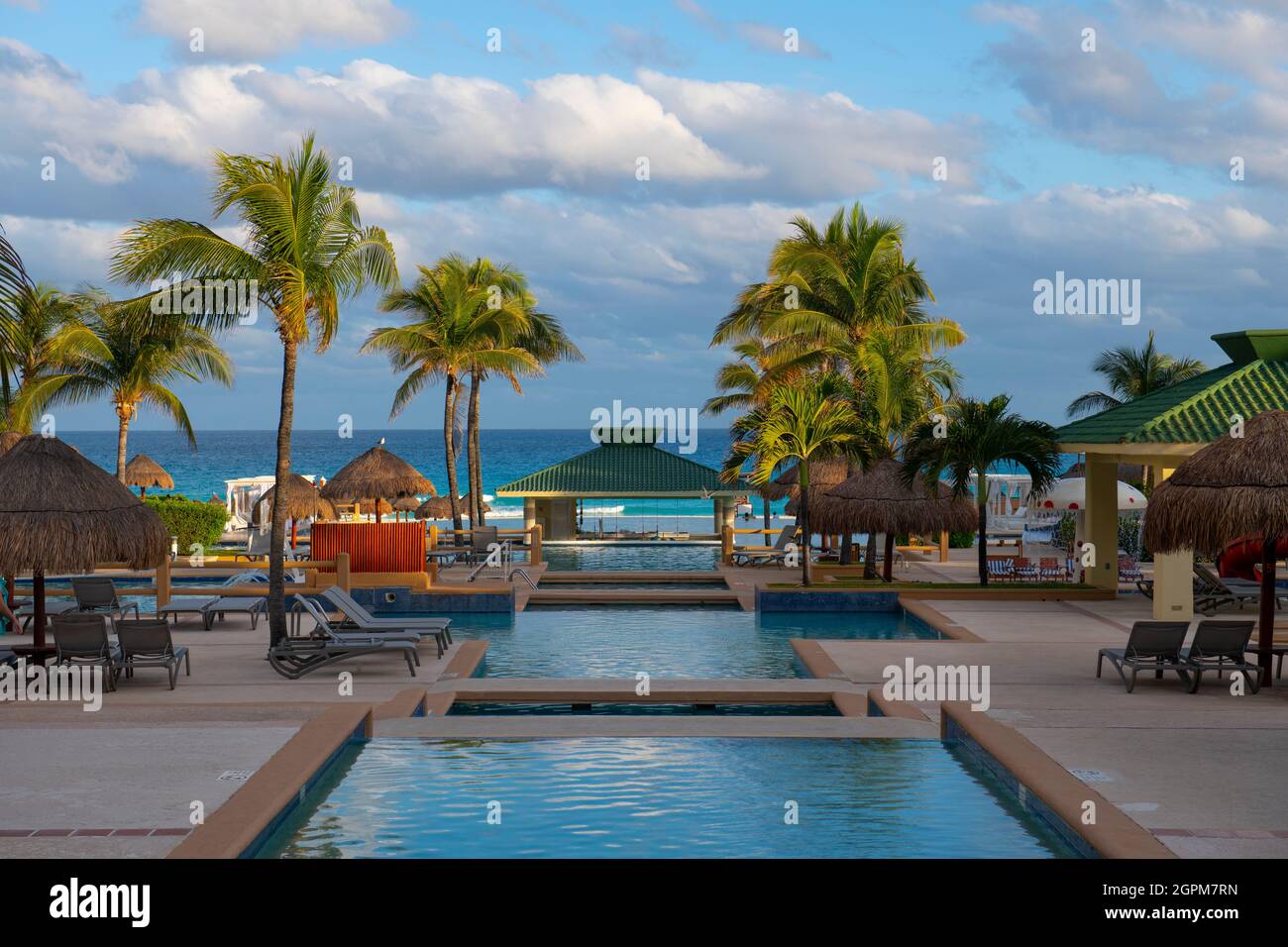 Iberostar Selection Cancun hotel outdoor swimming pool with beach and ...