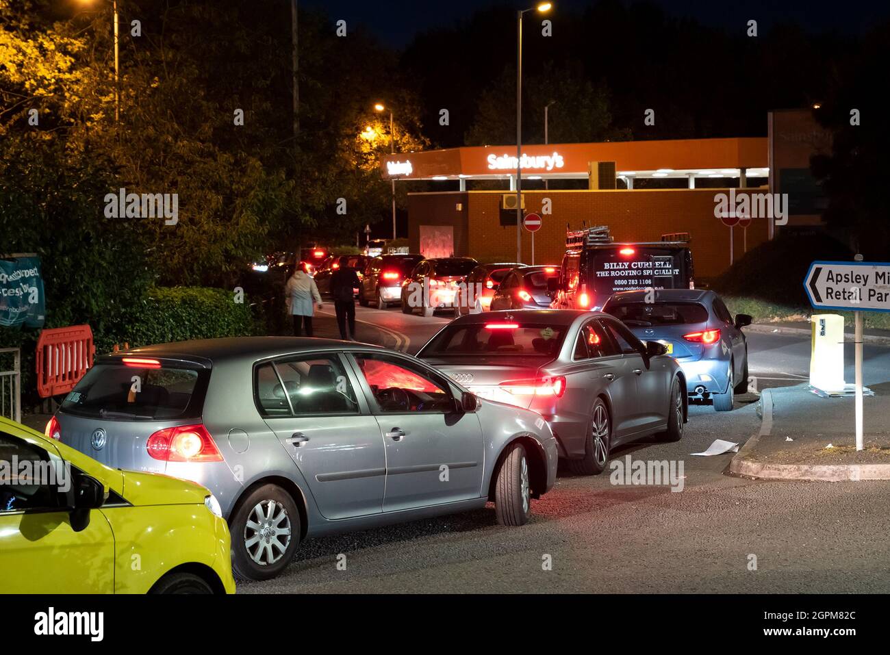 In long queue of motorists to fill up with petrol hi-res stock ...