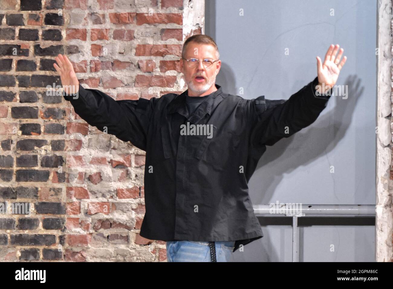 Designer Jonny Johansson acknowledges the audience during the Acne ...