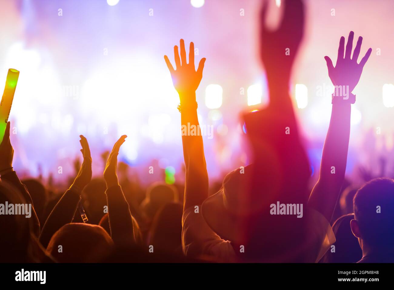 crowd with raised hands at concert festival Stock Photo - Alamy