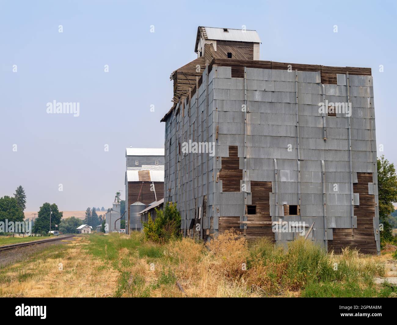 The damaged metal siding on a grain elevator in southeastern Washington ...